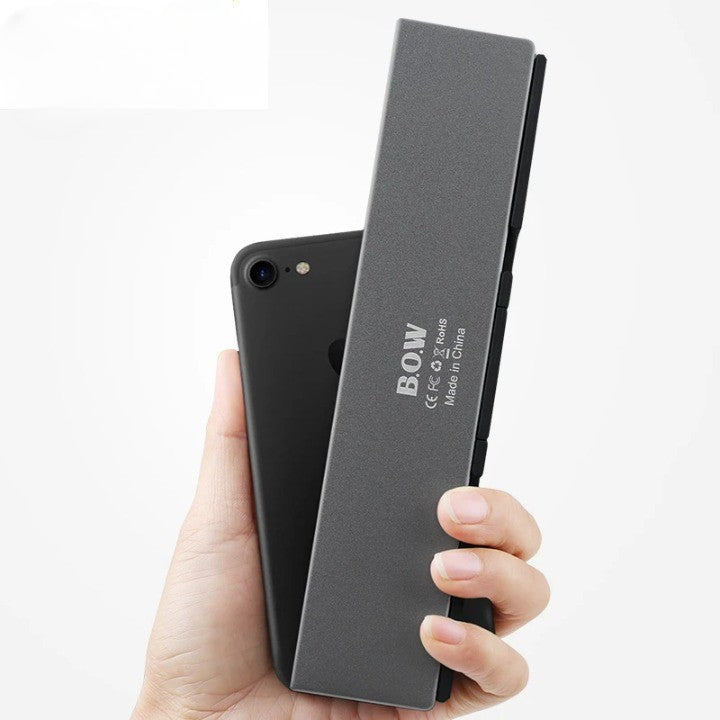 Multi-Device Connection Mini Foldable Bluetooth Keyboard · Mavigadget